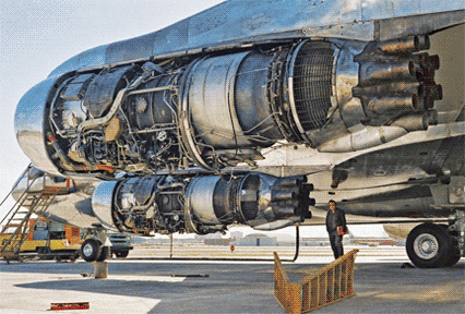 An unimpeded view of a Boeing 707's port side engines, each equipped ...