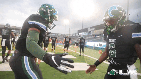Football Handshake GIF by GreenWave - Find & Share on GIPHY