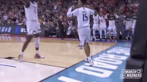 Flexing Cane Broome GIF by NCAA March Madness - Find & Share on GIPHY