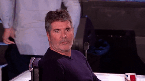 Simon Cowell Reaction GIF by Top Talent - Find & Share on GIPHY