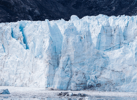 Glacier Bay, Alaska. 350 feet of ice crumbling down from the face of ...