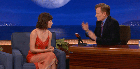Conspiring Lizzy Caplan GIF by Team Coco - Find & Share on GIPHY