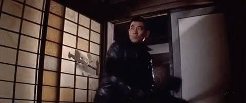Robert Mitchum GIF by Warner Archive - Find & Share on GIPHY