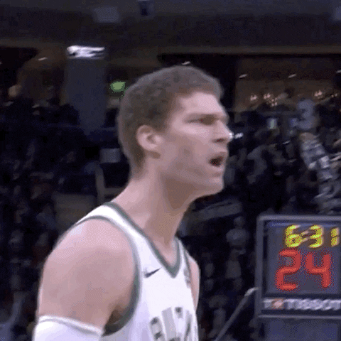 Fiserv Forum Christmas GIF by Milwaukee Bucks - Find & Share on GIPHY